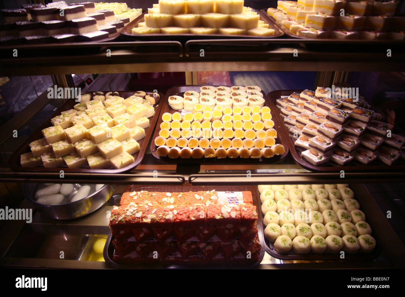 Display of sweets in Indian restaurant Birmingham Stock Photo - Alamy