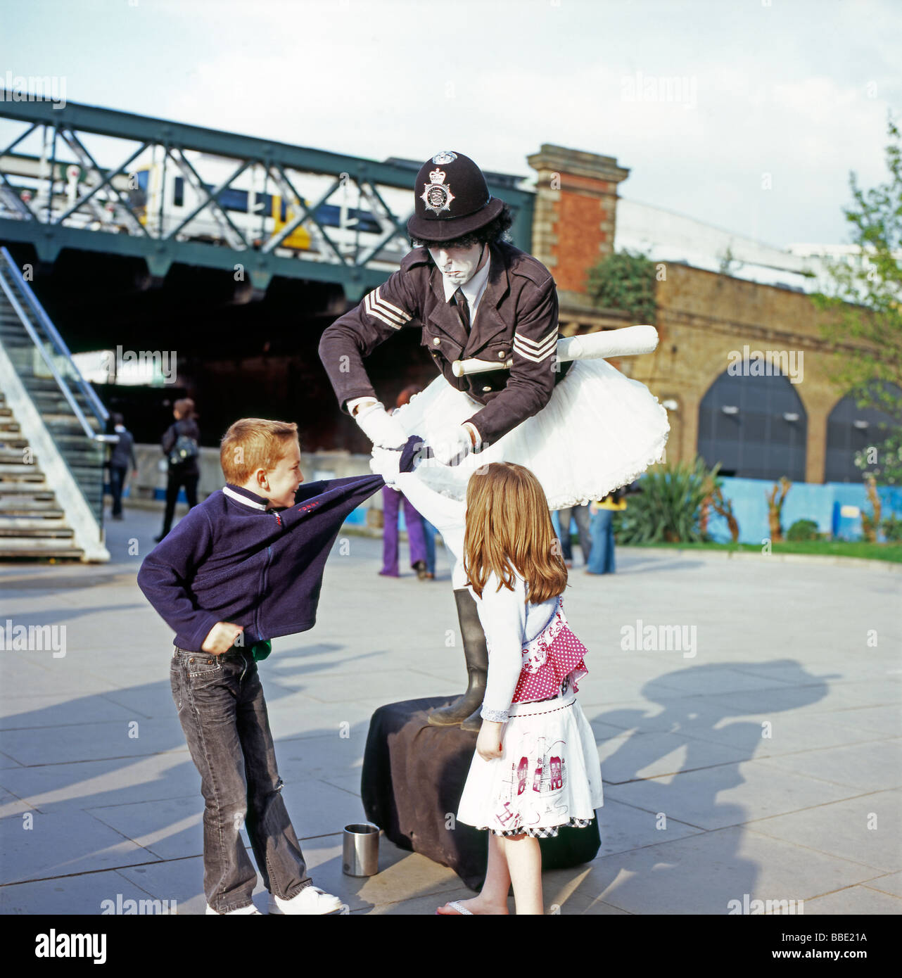A street entertainer dressed as a London policeman London bobby ties ...