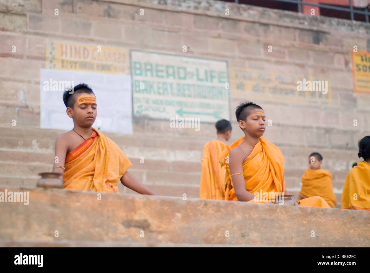 Young yogis doing asana and puja in Varanasi, India Stock Photo - Alamy