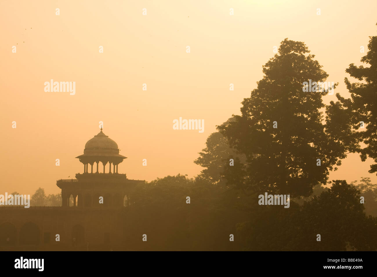 Early morning sun rise view of the surrounding buildings and trees at ...