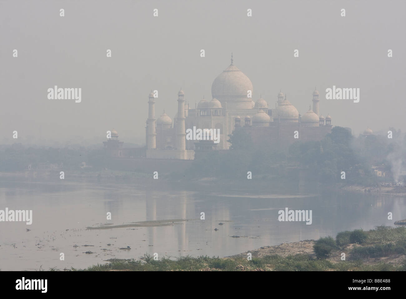 View of Taj Mahal viewed across River in misty conditions, Agra, India ...