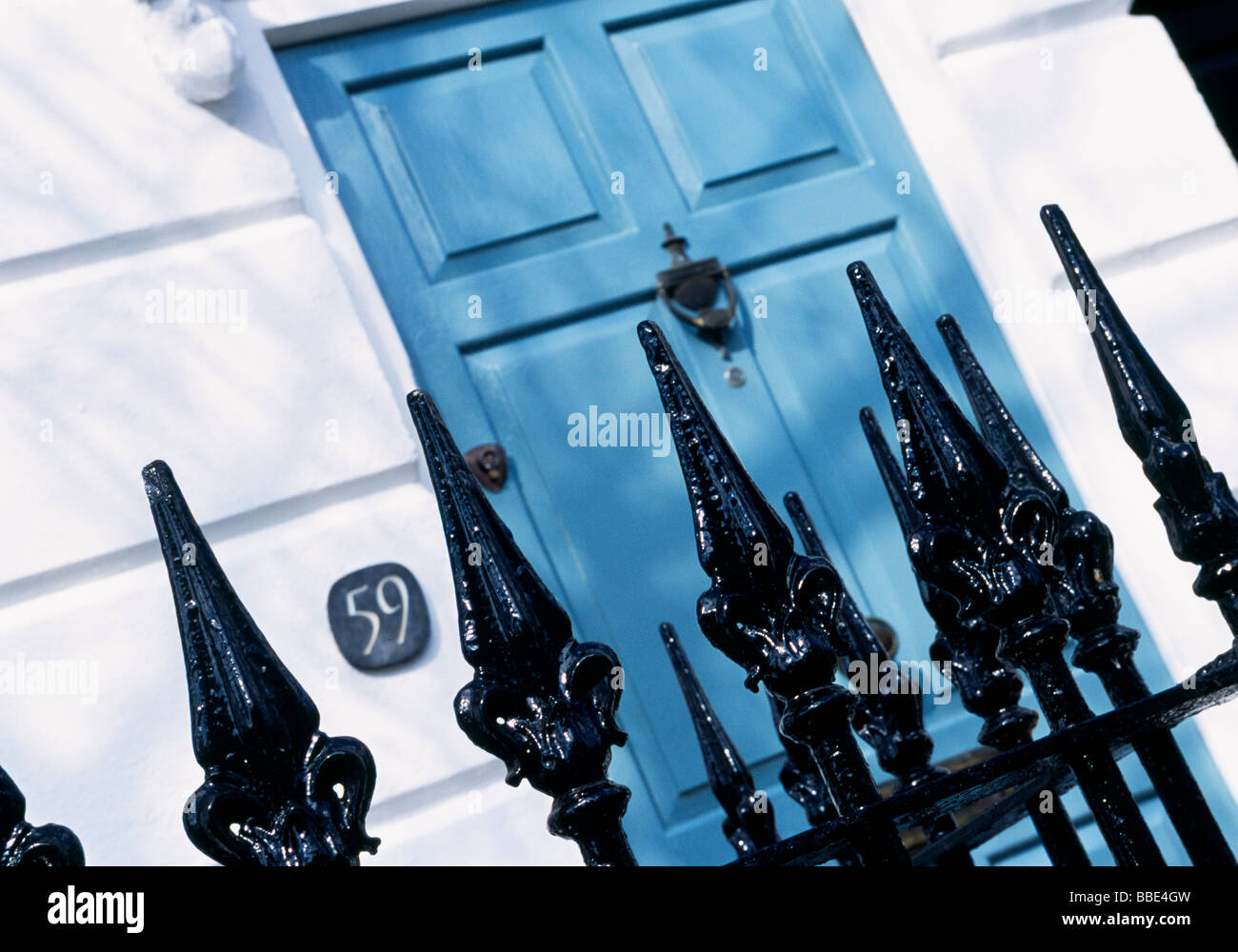 blue front door, front door, iron railing Stock Photo - Alamy