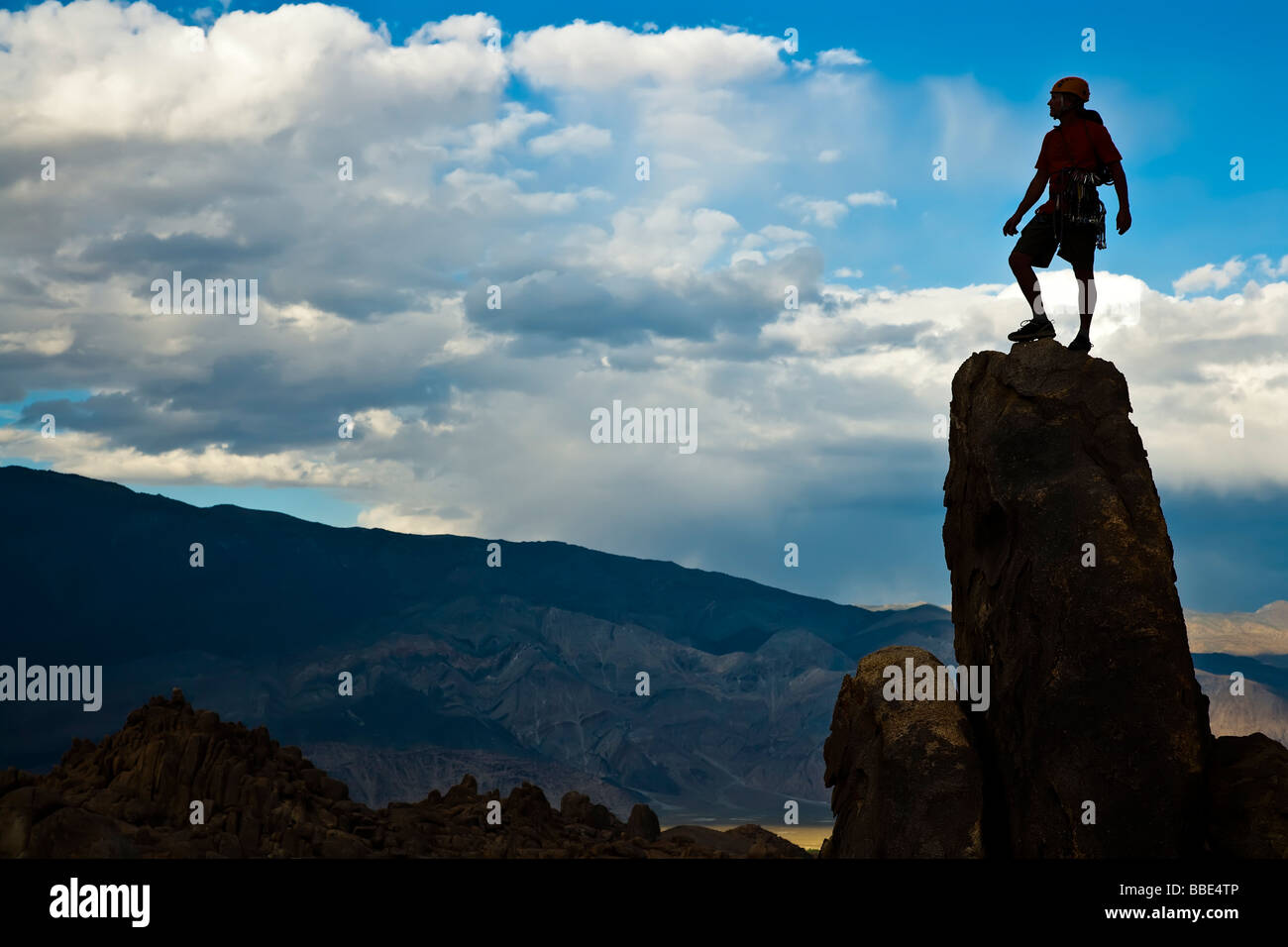 Climber on the summit Stock Photo - Alamy