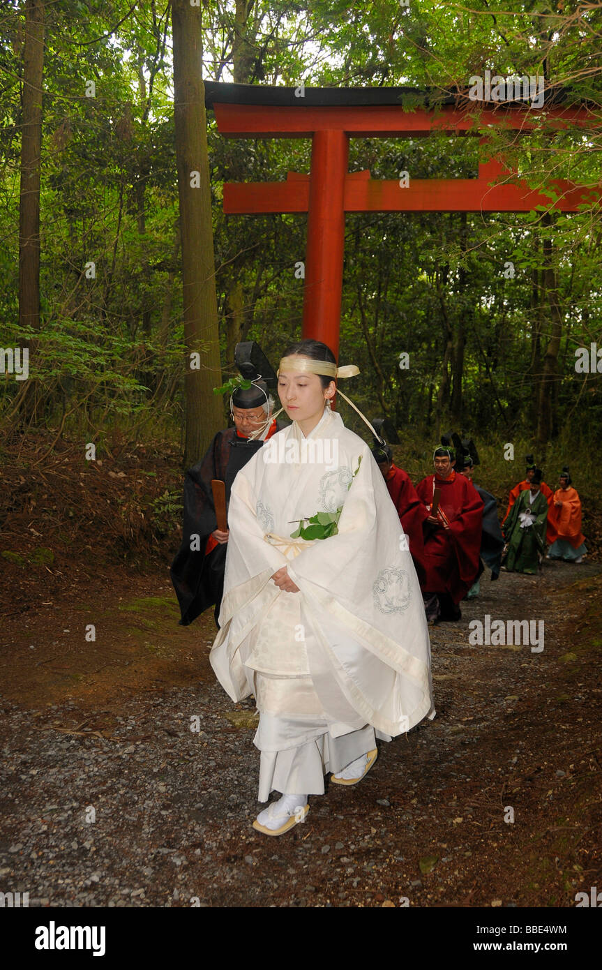 Miko, shrine maiden at the procession from the Shimogamo shrine through ...