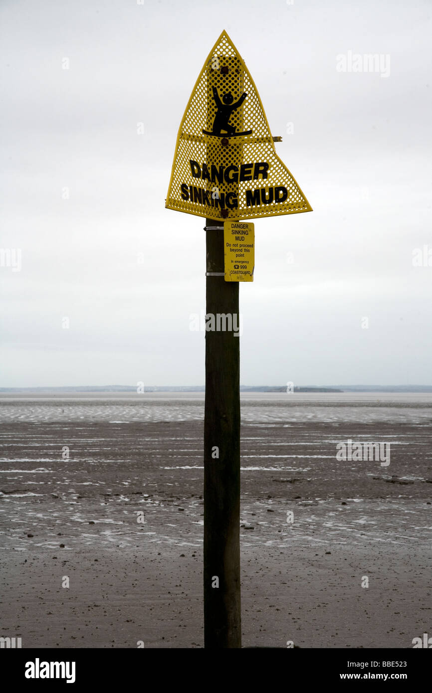 Sign warning of sinking mud on the beach at Weston Super Mare Stock ...