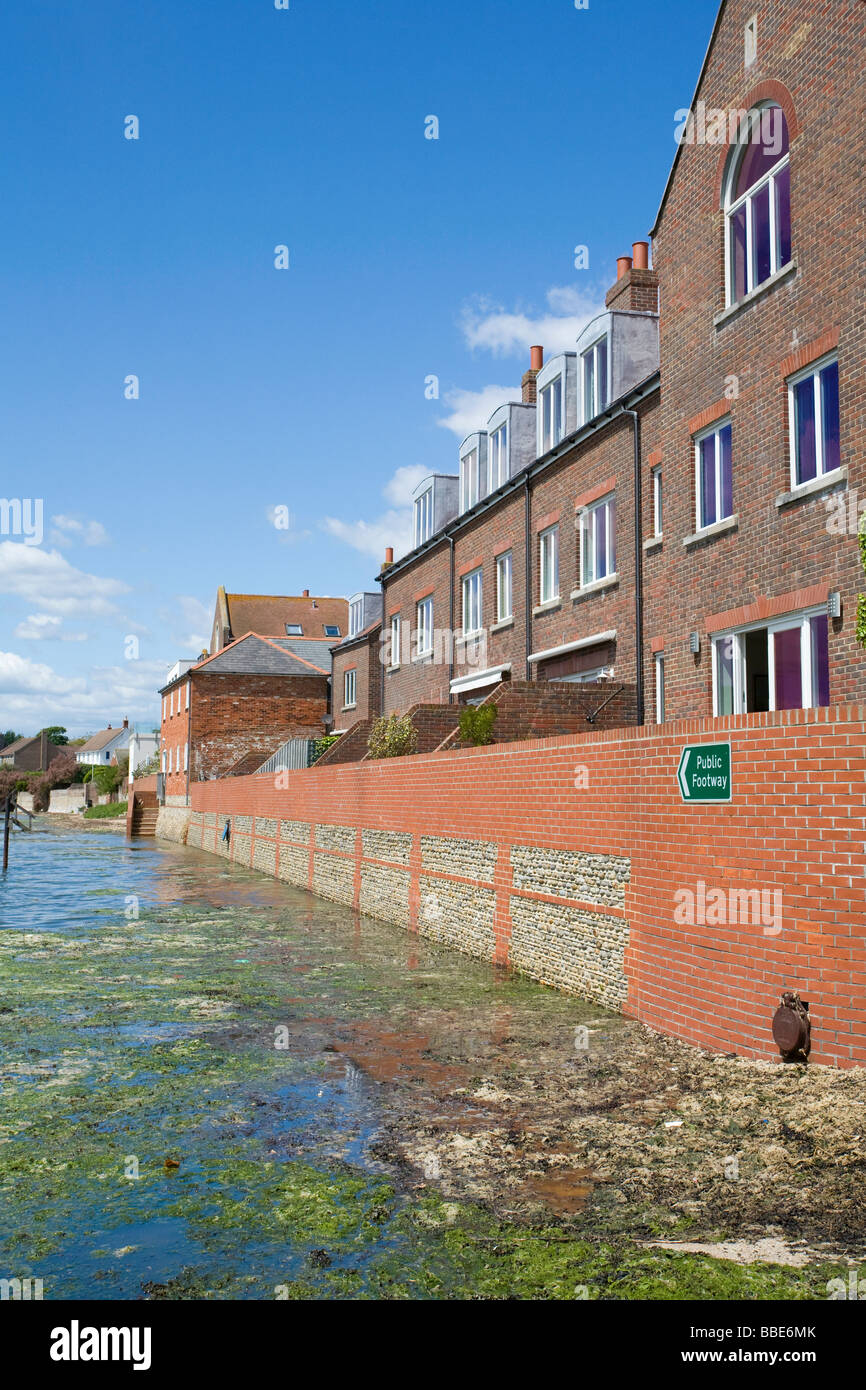 Public footpath covered with water at high tide. Emsworth Harbour ...