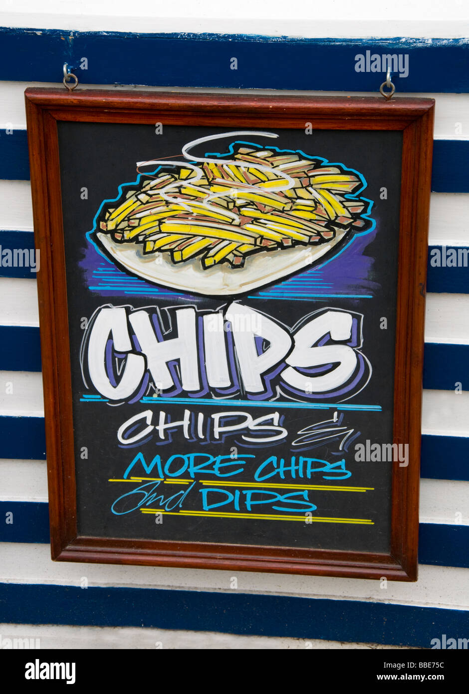 Broadstairs, Kent, England, UK. Restaurant sign "Chips, Chips, more ...