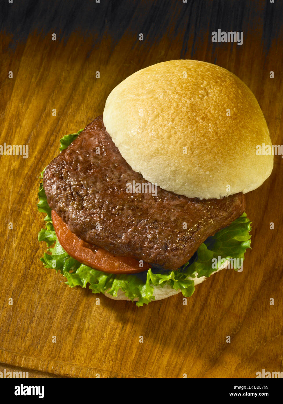 Fresh made hamburger on roll bun Stock Photo - Alamy