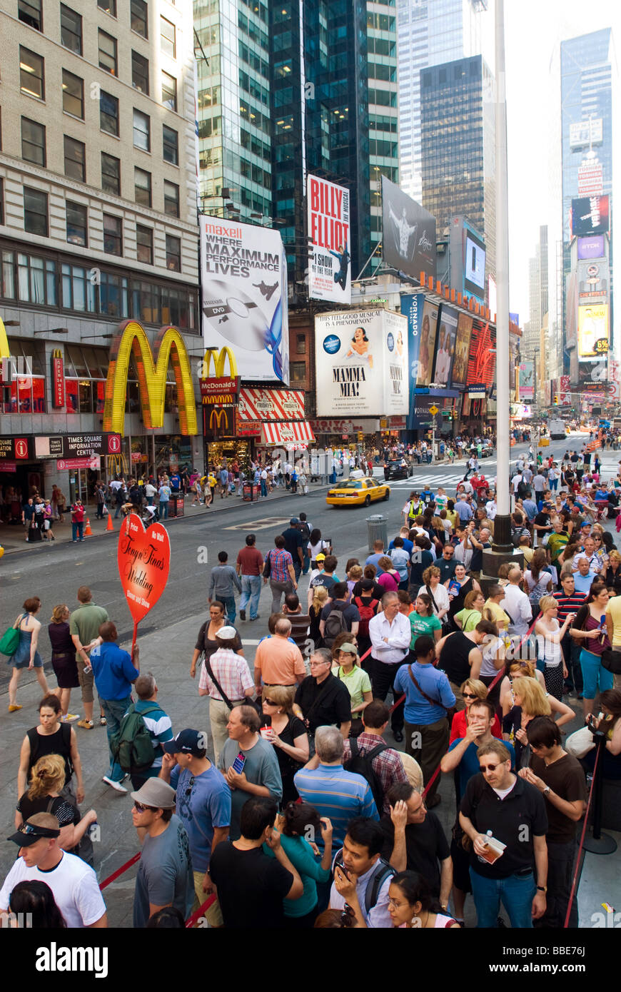 Theatregoers on line at the TKTS ticket booth in Times Square in New ...
