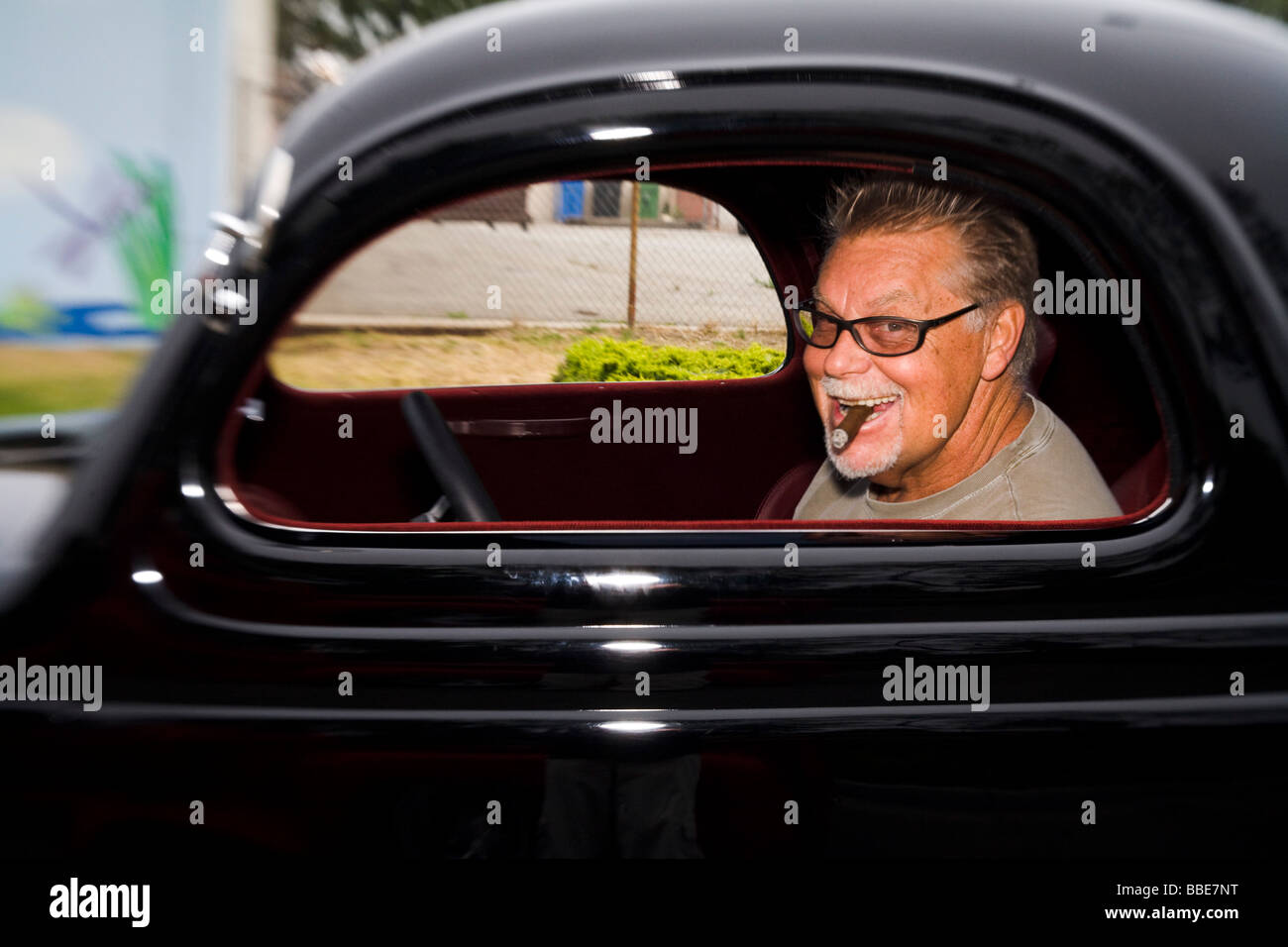 Driving a classic car at the parade Culver City Car Show Culver City ...