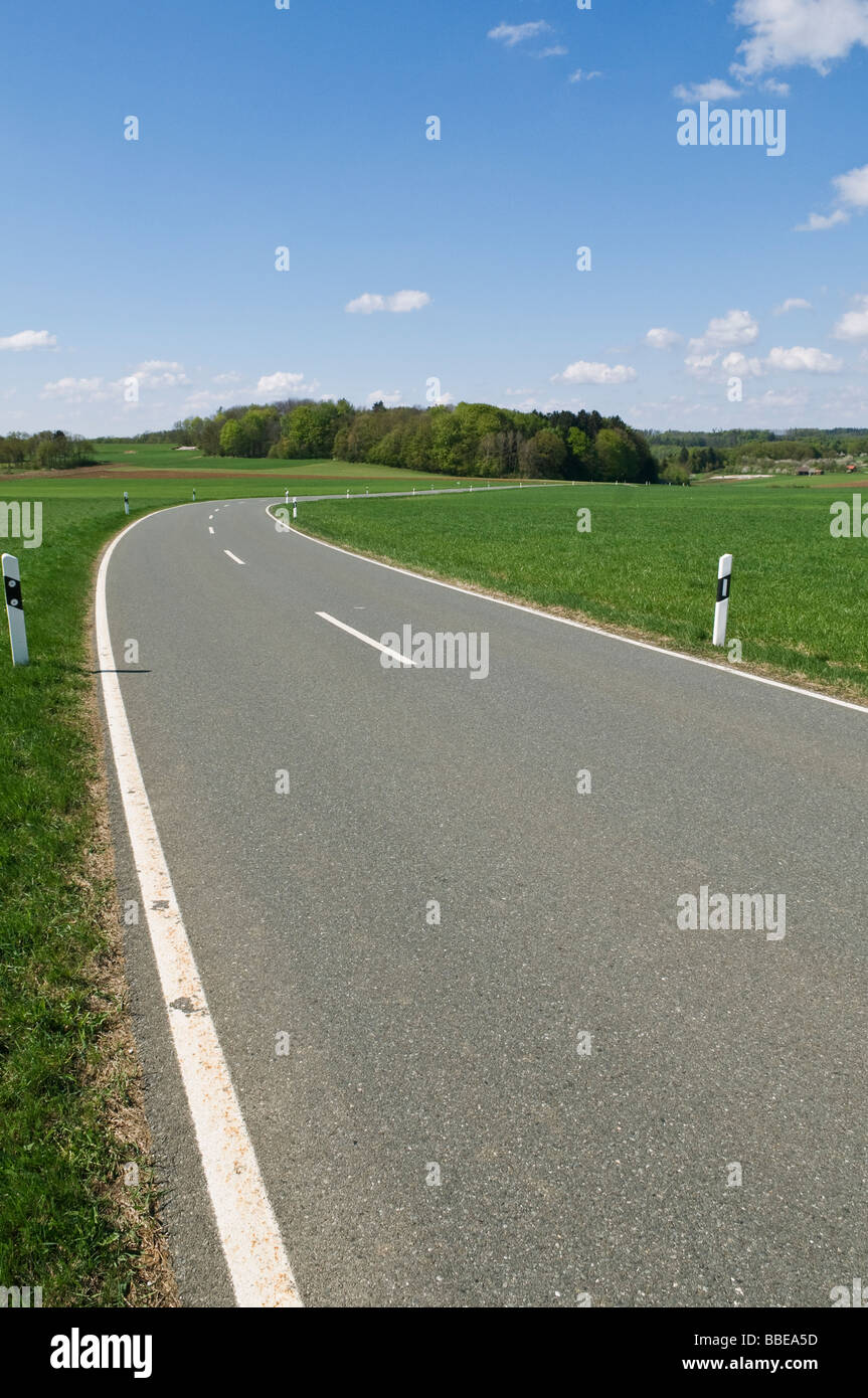 Rural country road through farm field, Upper Franconia, Bavaria ...