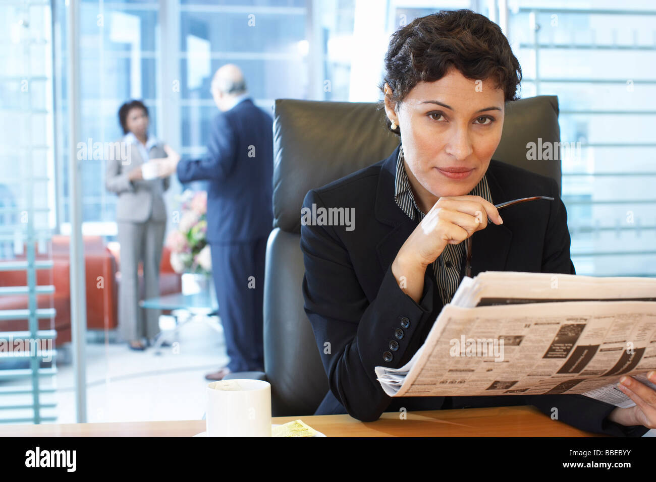 Office lady reading newspaper hi-res stock photography and images - Alamy