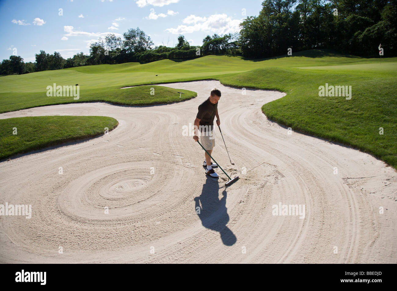 Raking sand pit hi-res stock photography and images - Alamy