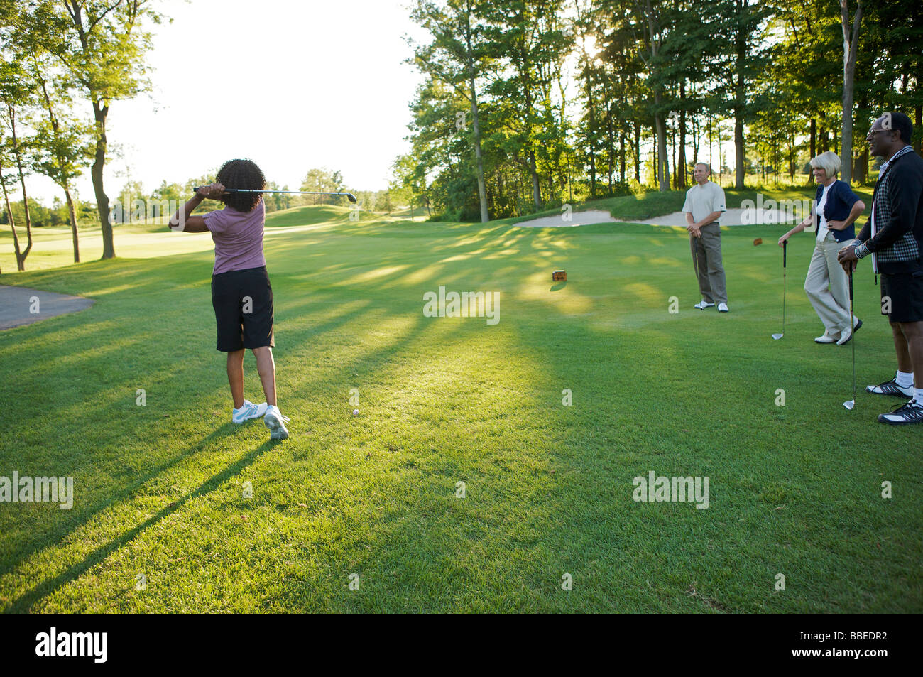 Caucasian couple friends playing golf hi-res stock photography and ...