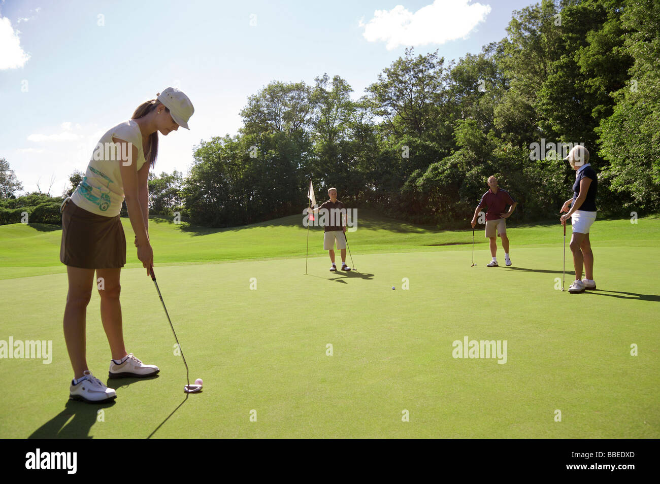 Mother daughter playing golf hi-res stock photography and images - Alamy