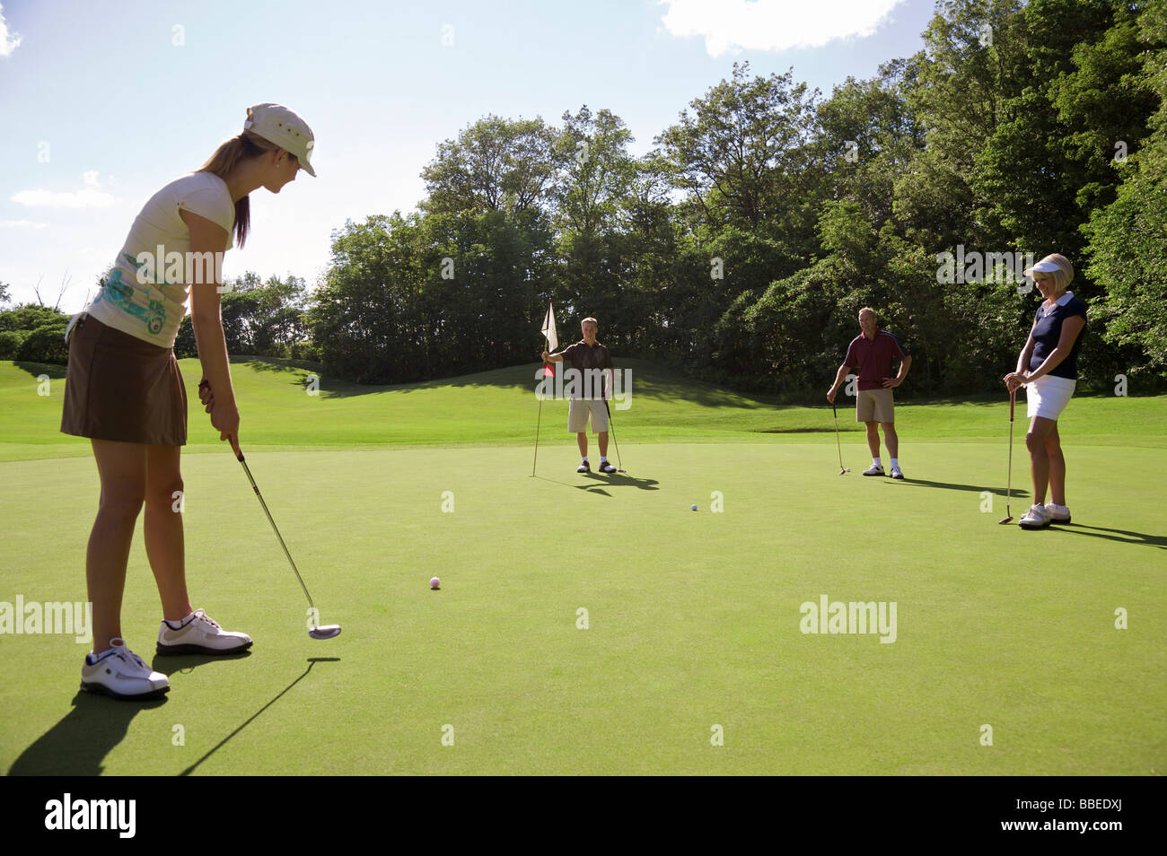 Father son playing golf hi-res stock photography and images - Alamy