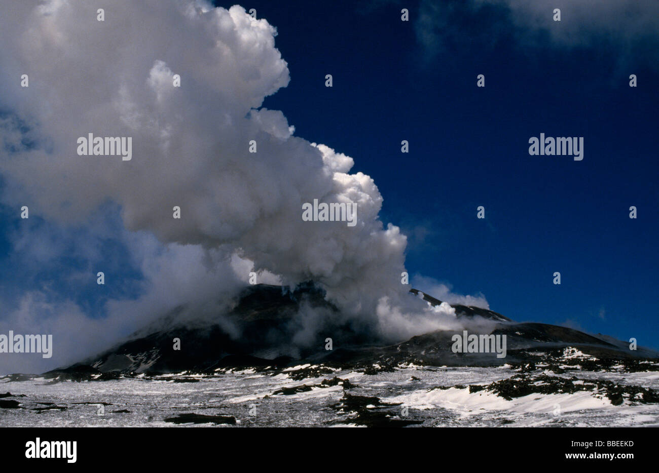 ITALY Sicilly Mount Etna Volcano Smoke and ash rising from the snow ...
