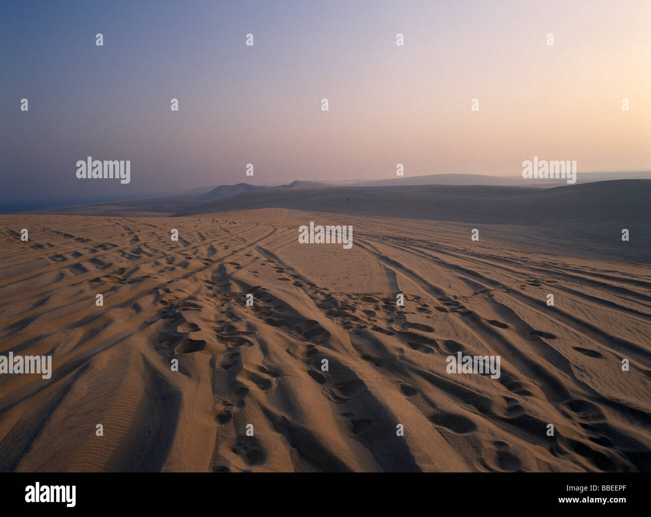 QATAR South East Desert View over sand dunes at sunset near the Sealine ...