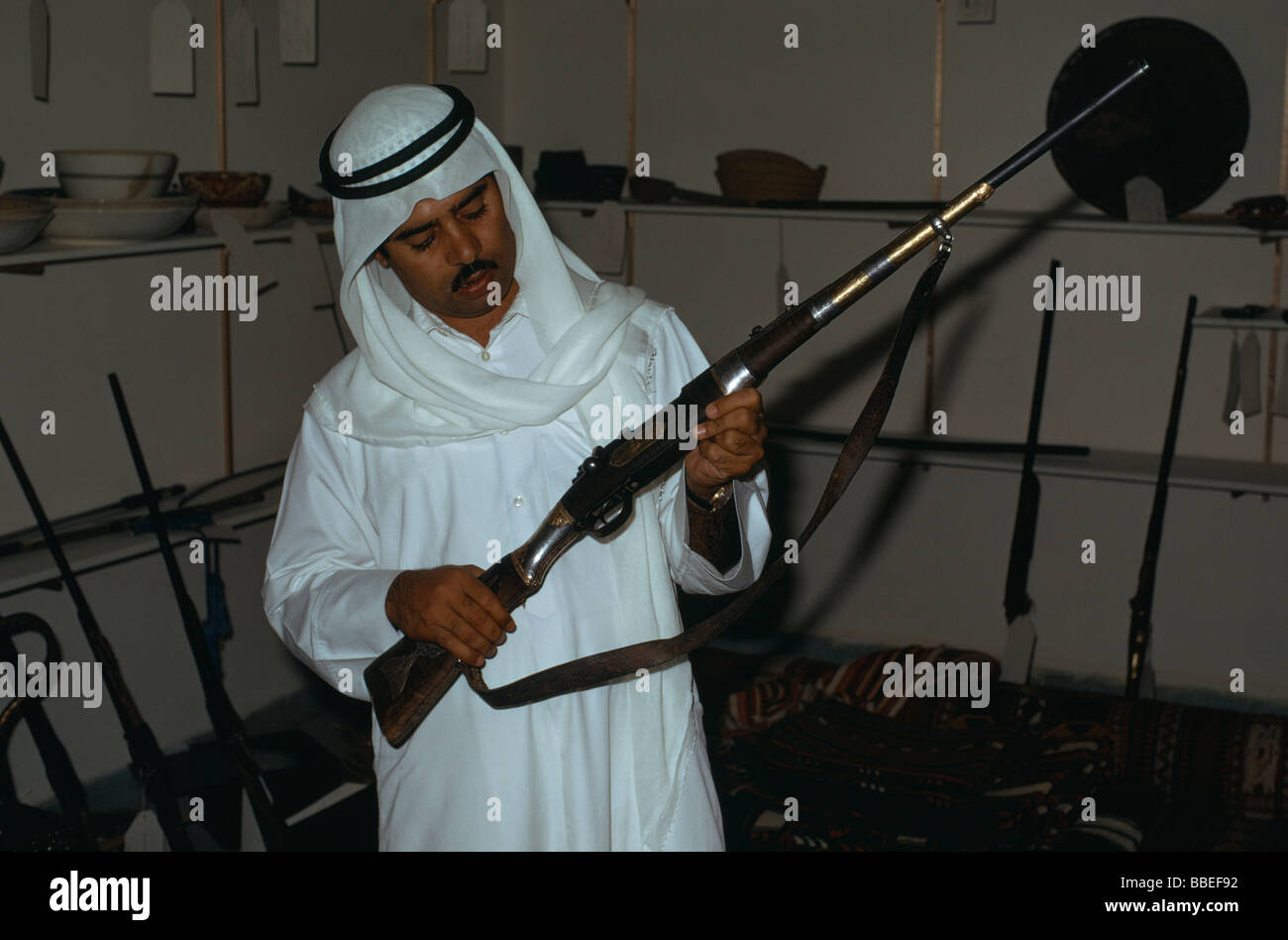 QATAR Middle East Gulf State Doha Museum Arab Man holding an old ...