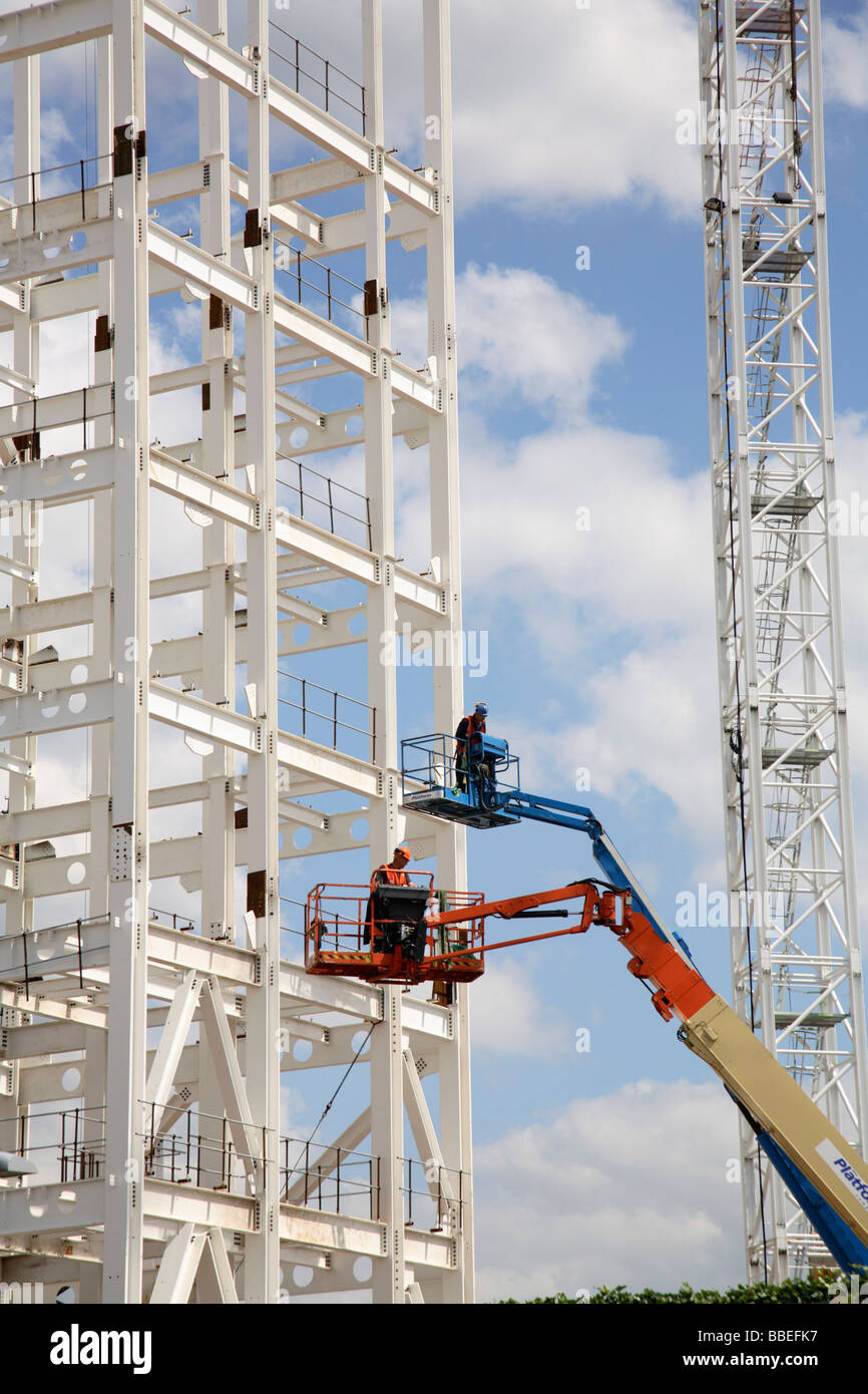 Workers construct steel framed structure hi-res stock photography and ...