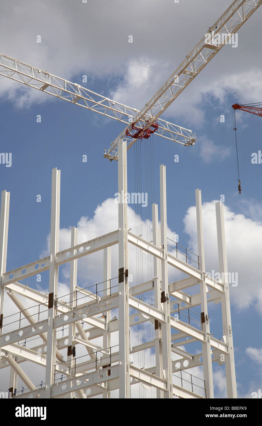 Cranes and Frame of Building at Construction Site Stock Photo - Alamy