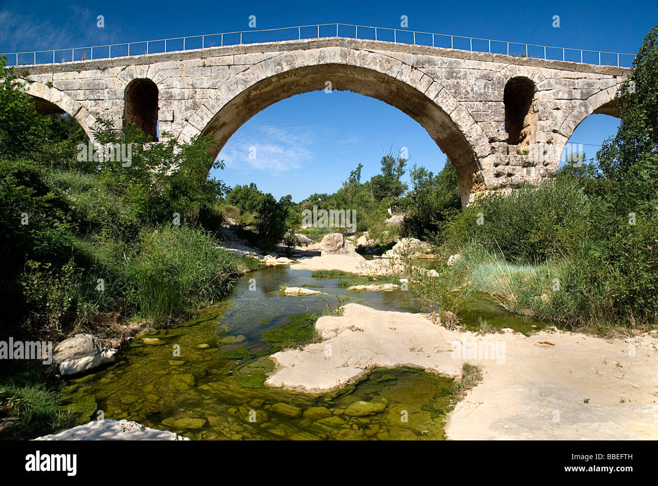France, Provence-Alpes-Cote d'Azur, Pont Julien, arched Roman bridge ...