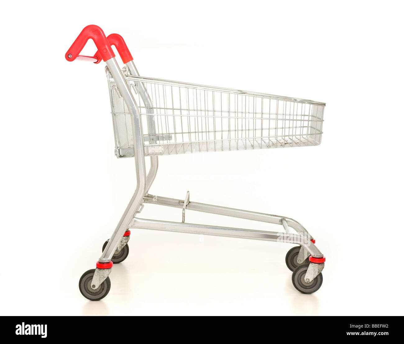 Empty shopping trolley on white background Stock Photo - Alamy