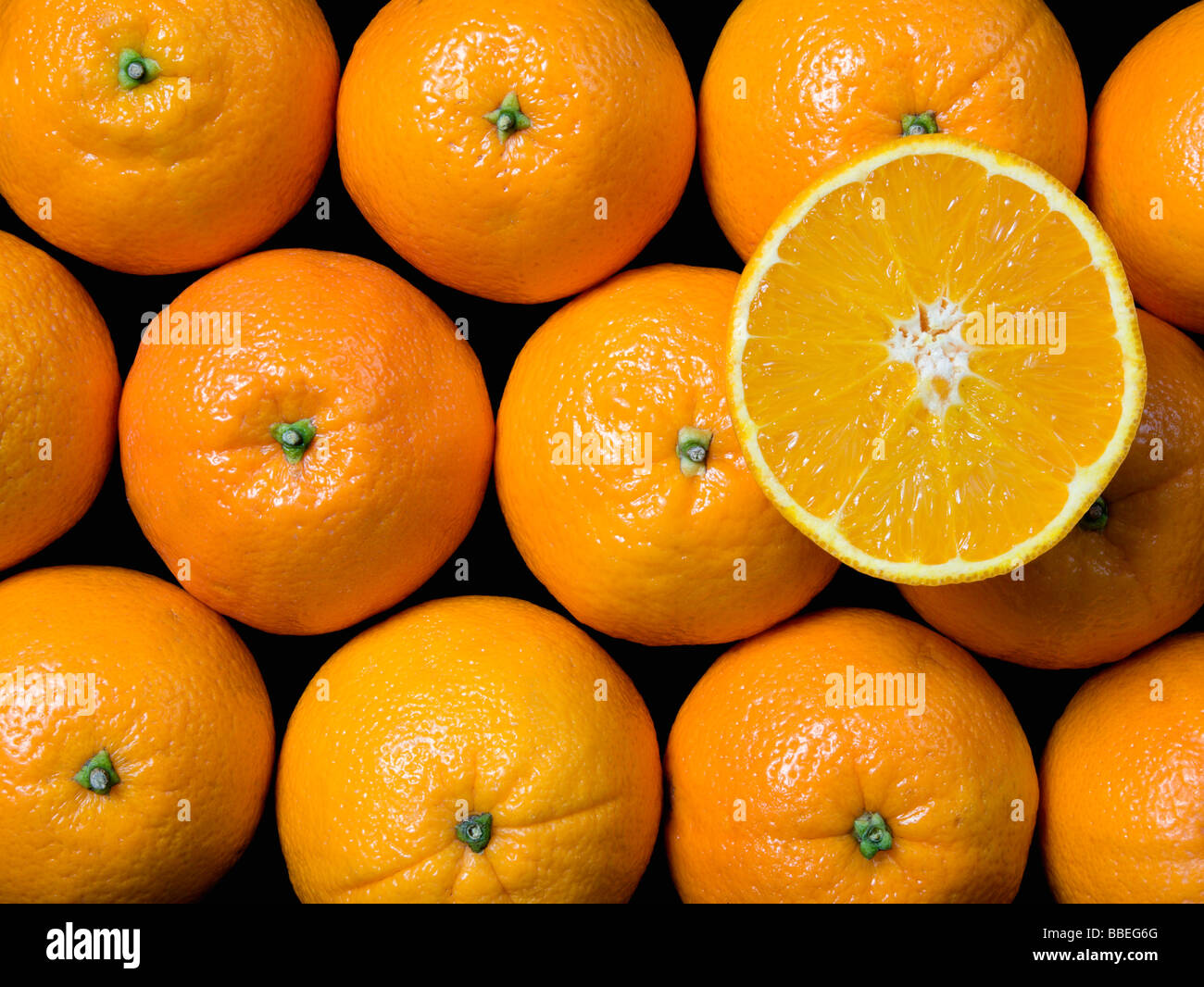 FOOD Citrus Fruit An overhead view down onto a group of oranges with ...