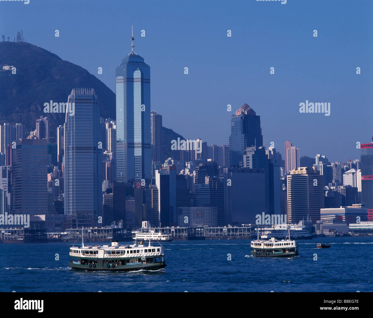 CHINA Hong Kong Victoria Harbour Star Ferries crossing Harbor with high ...