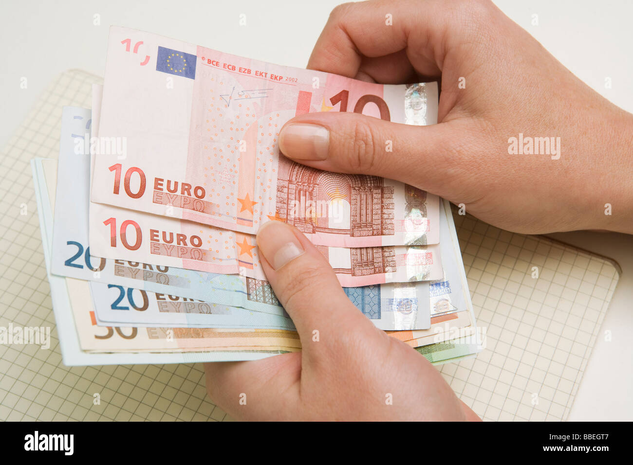 Hands Counting Money Stock Photo - Alamy