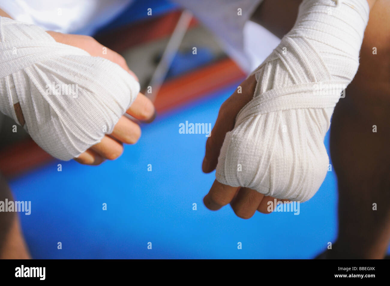 Boxer's hand and knuckles tied with bandage Stock Photo - Alamy