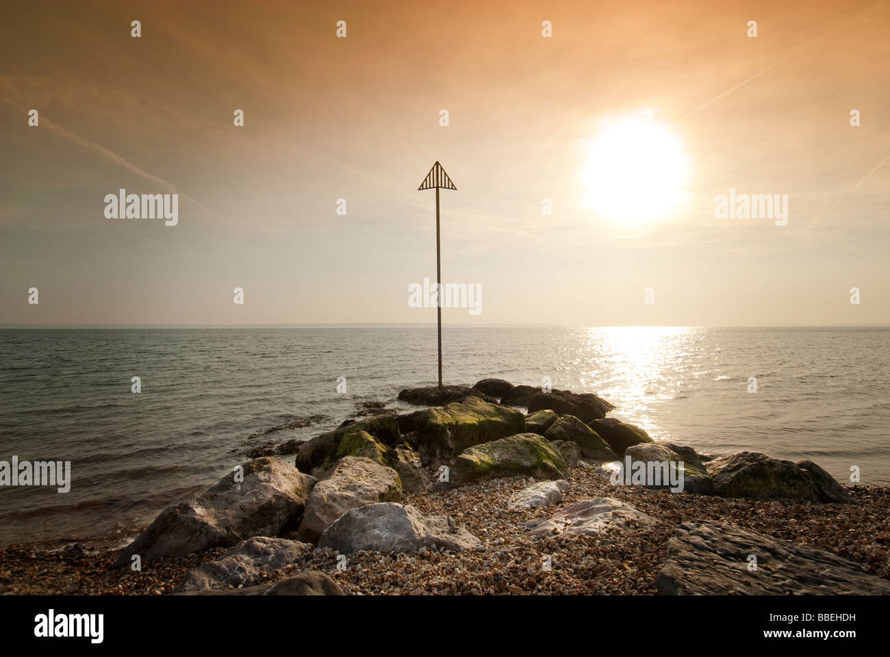 navigation marker on beach outcrop Stock Photo - Alamy