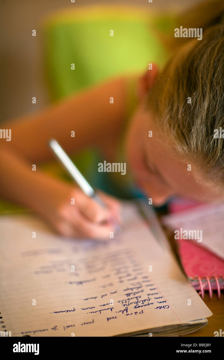 8 year old girl writing hi-res stock photography and images - Alamy