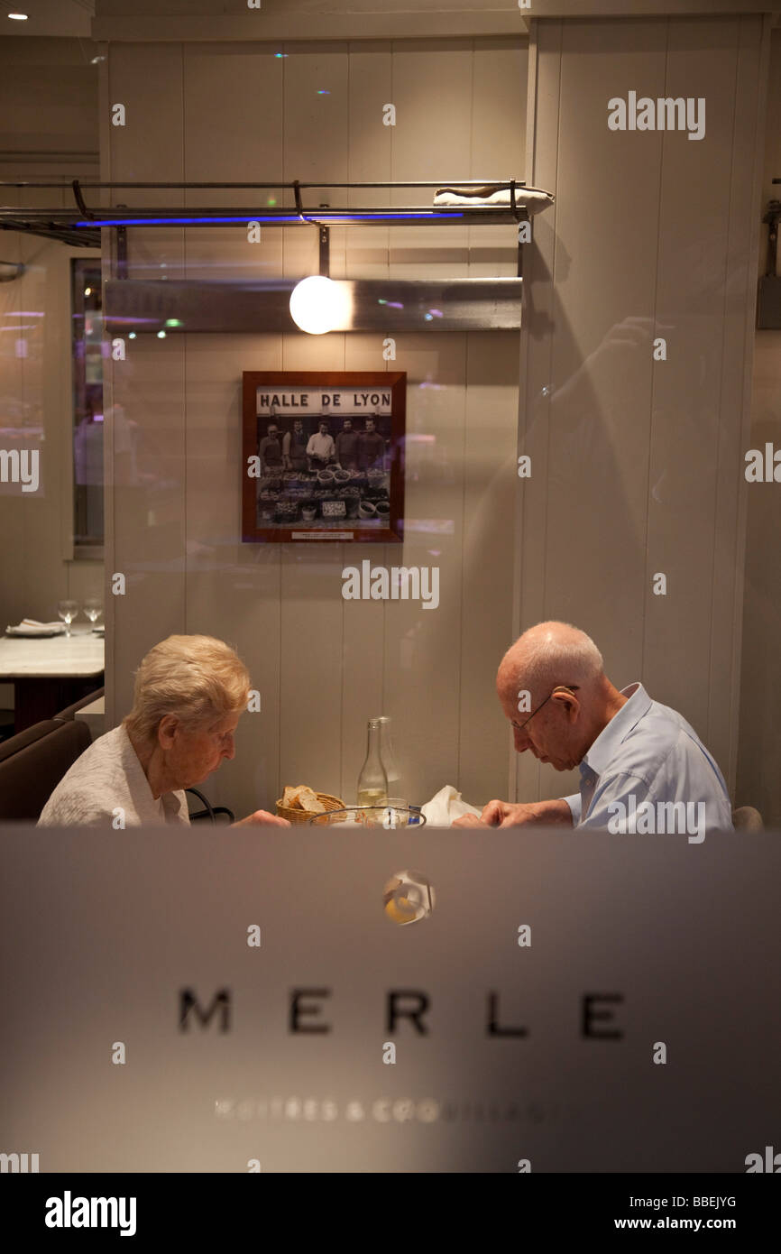 Old retired couple in Merle Sea Food restaurant in Les Halles de Lyon ...