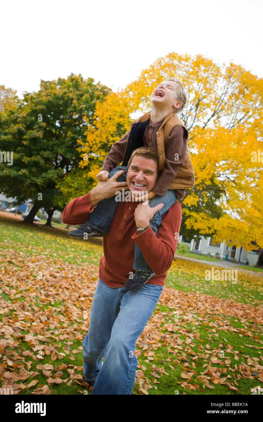 Little Boy Riding on His Father's Shoulders, Portland, Oregon, USA ...