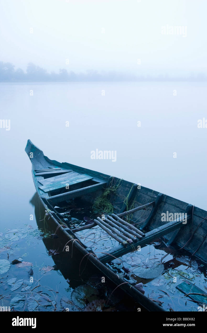 Canoe in Morning Mist at Sras Srang, Angkor, Cambodia Stock Photo - Alamy