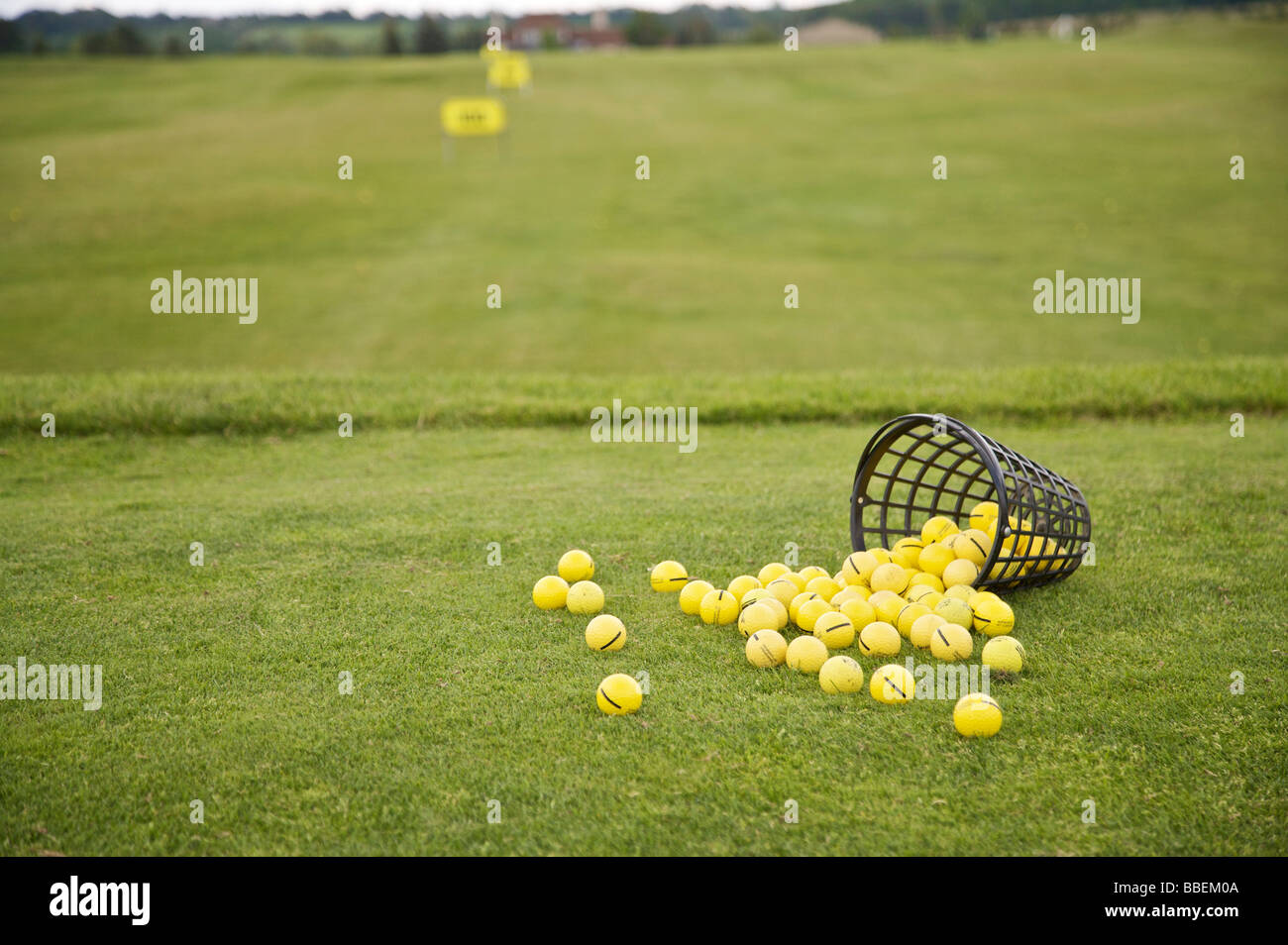 Golf ball bucket driving range hi-res stock photography and images - Alamy