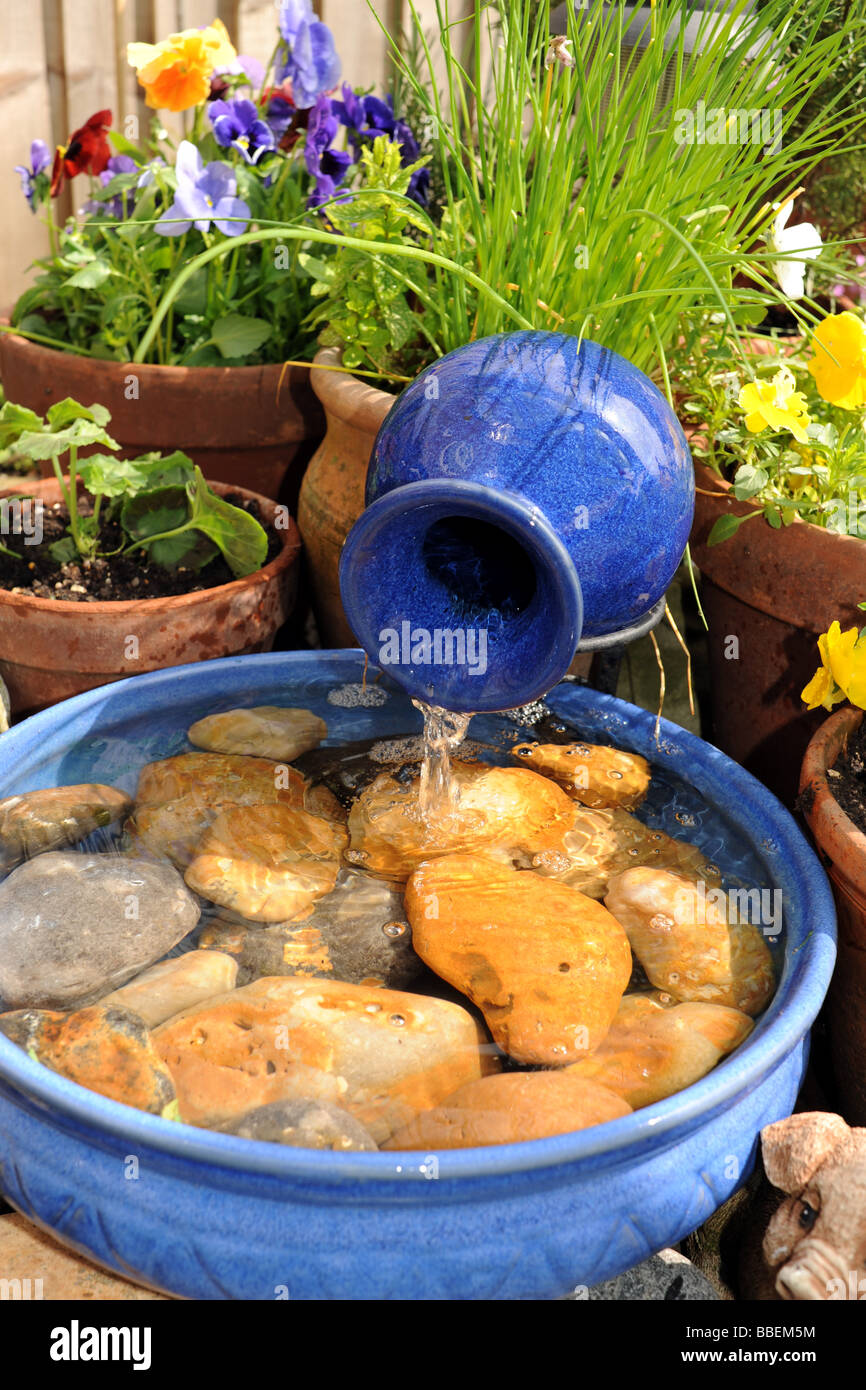 Environmentally friendly garden water feature powered by a solar panel ...