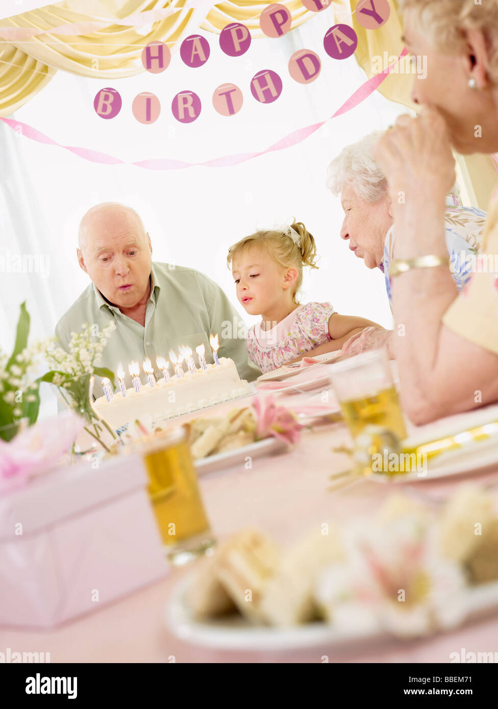 Seniors in a Retirement Home Celebrating a Birthday With Family Stock ...