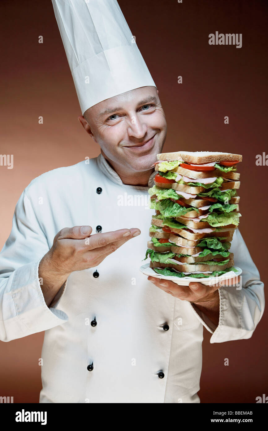 Smiling Man Holding Plate Big High Resolution Stock Photography and ...