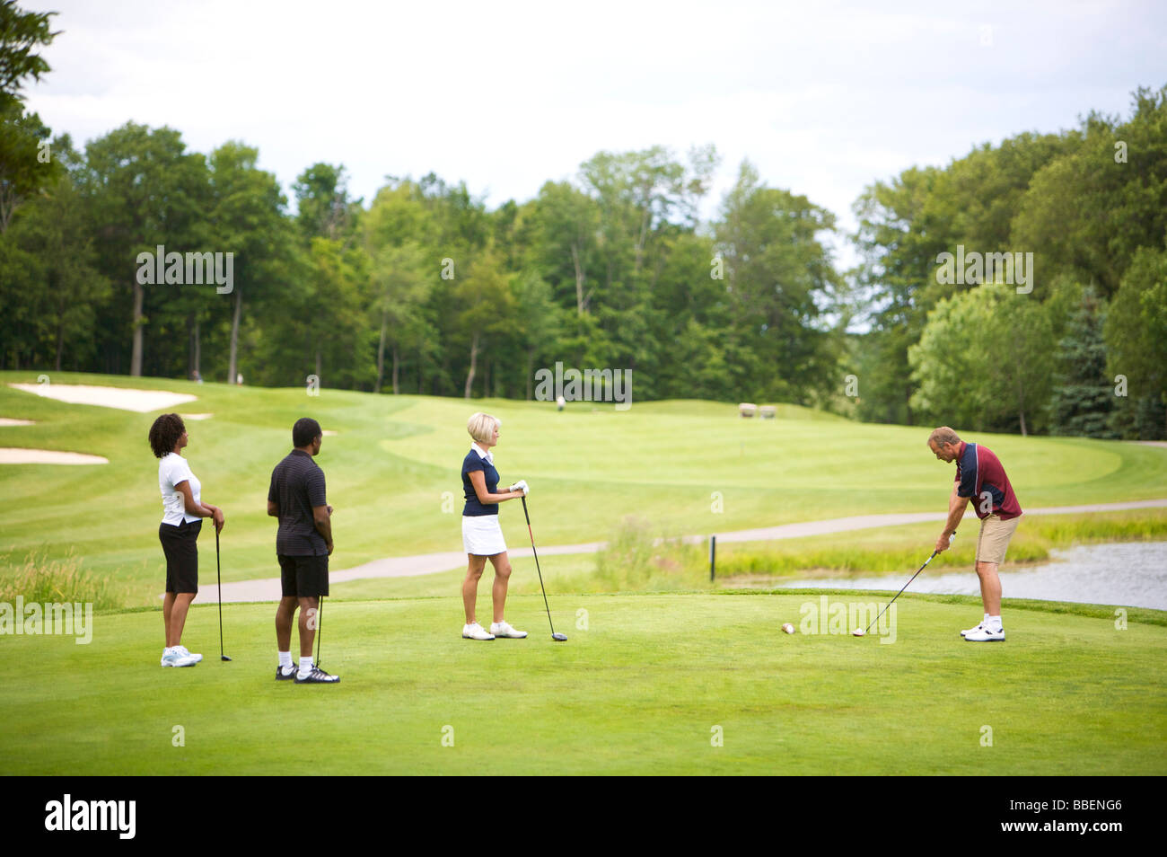 Female golfer pond hi-res stock photography and images - Alamy