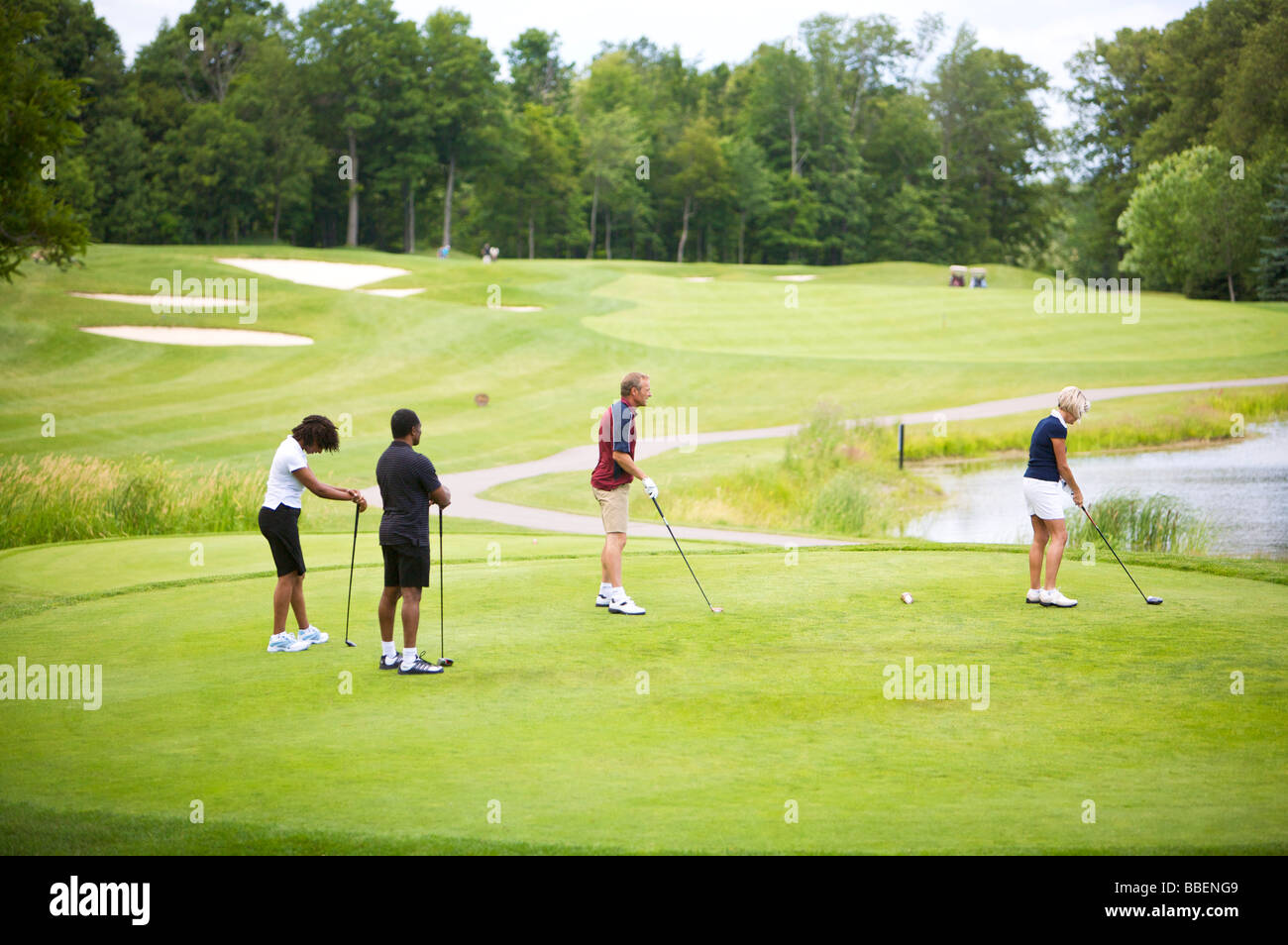 Female golfer pond hi-res stock photography and images - Alamy
