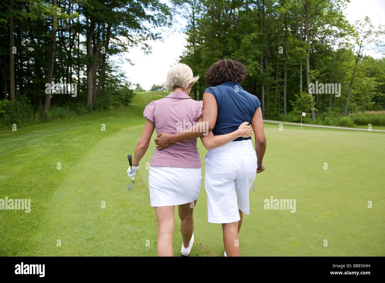 Two old friends hugging each other hi-res stock photography and images ...