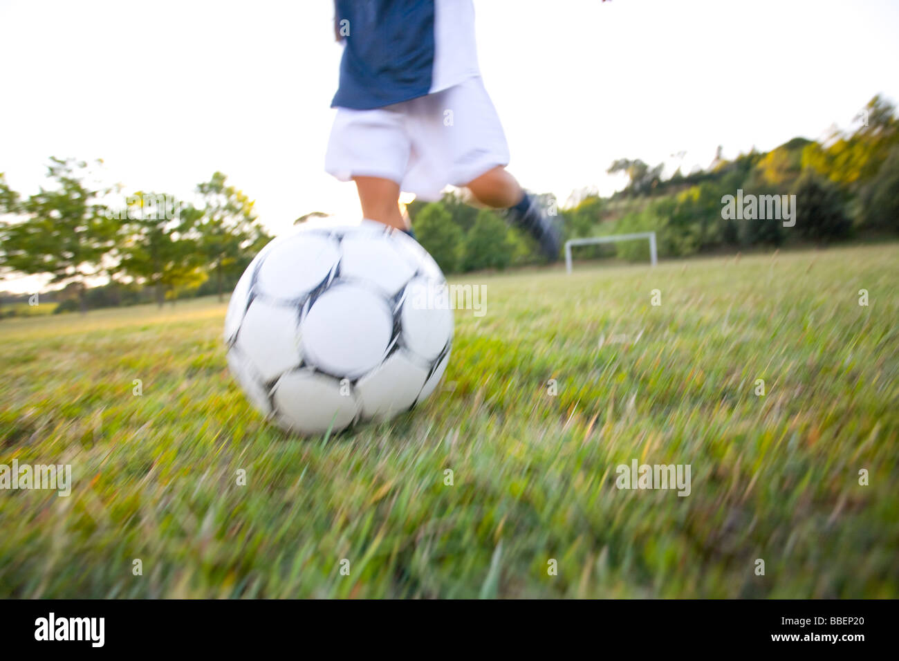 Footballer kicking ball hi-res stock photography and images - Alamy