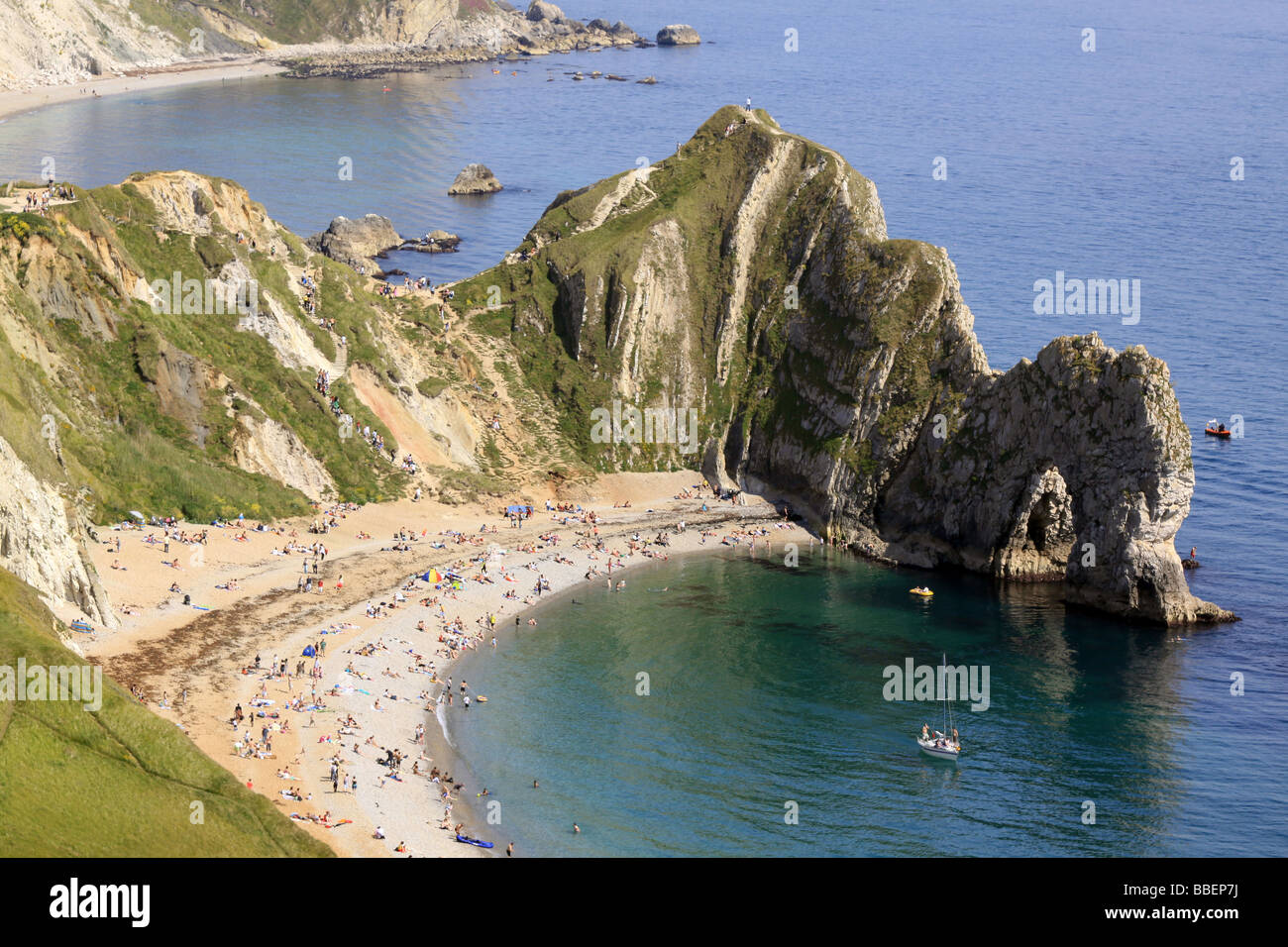 Durdle Door taken from the West of the bay. In the background Man O ...
