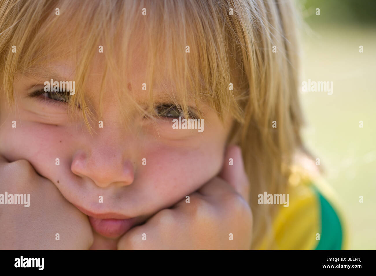 Footballer in upset mood and looking at camera Stock Photo - Alamy