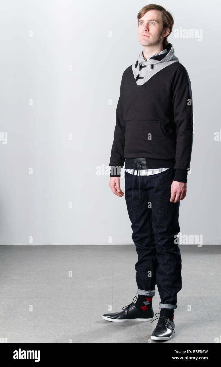 Man standing in a plain office Stock Photo - Alamy