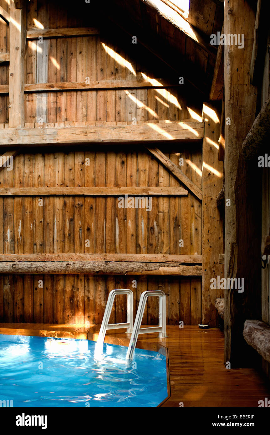 A Ladder in a Pool Inside a Barn, Montreal, Quebec Stock Photo - Alamy