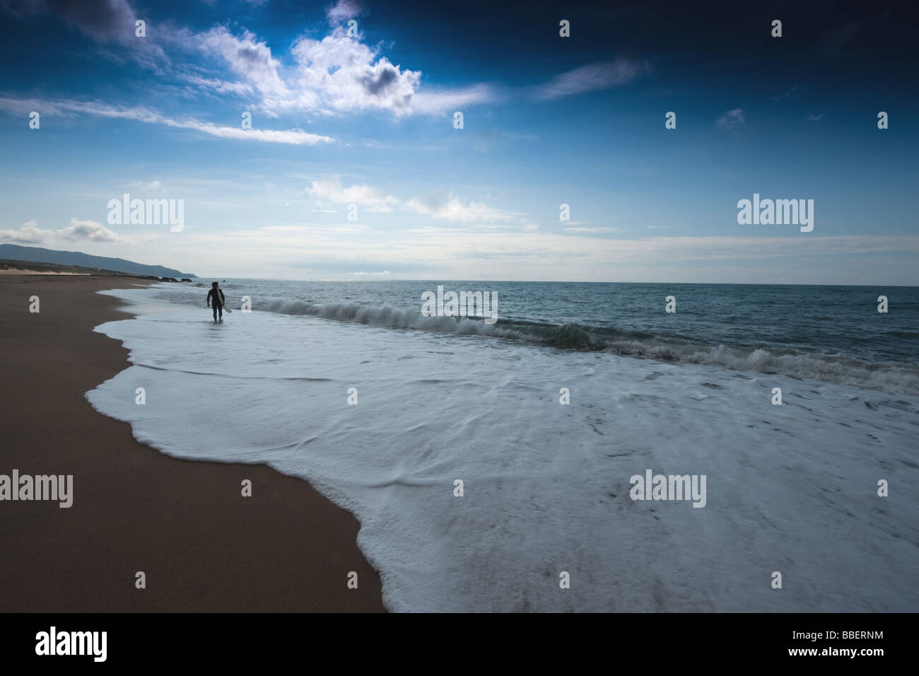 Surfer with surfboard Stock Photo - Alamy