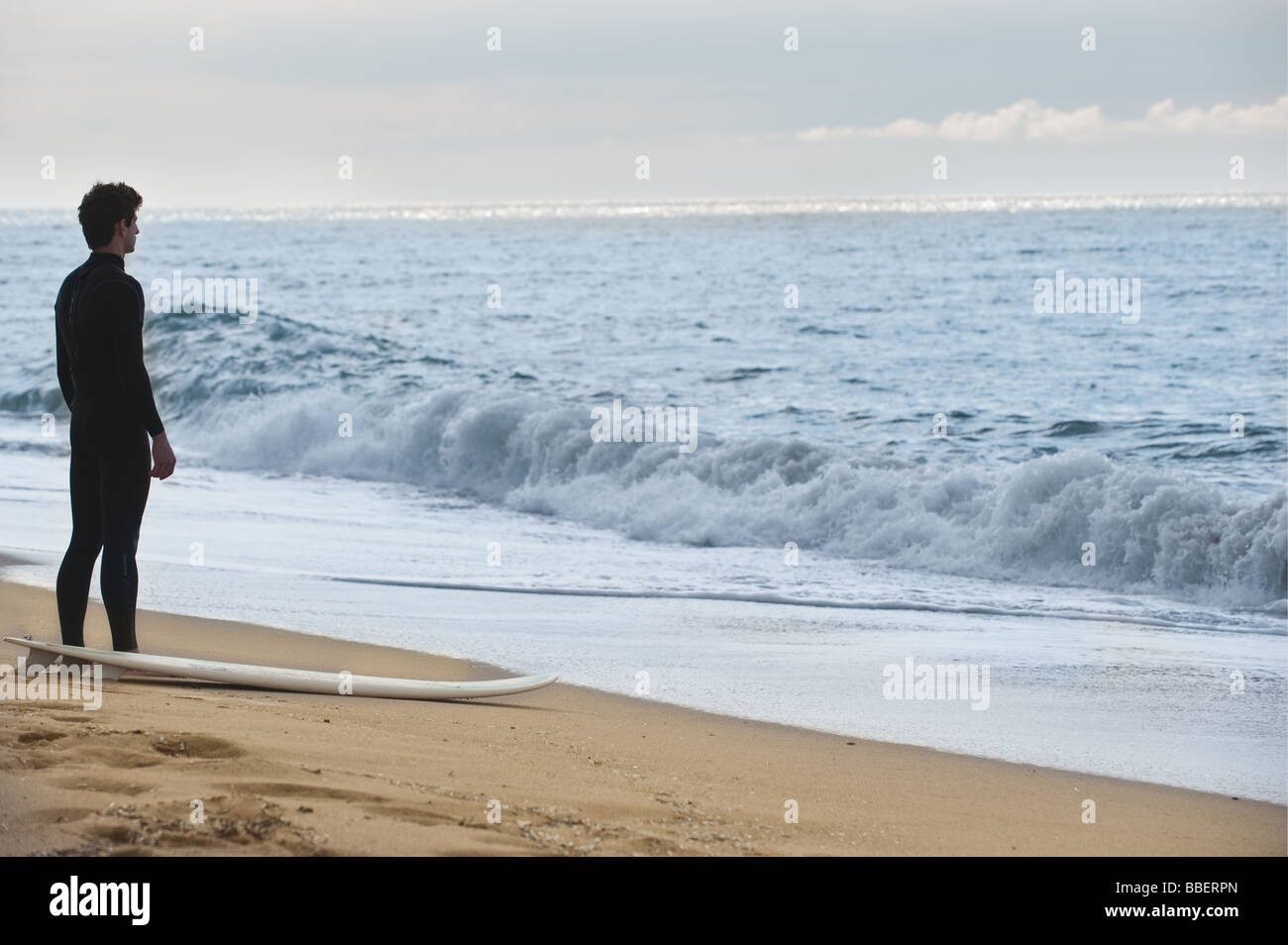 Surfer with surfboard Stock Photo - Alamy
